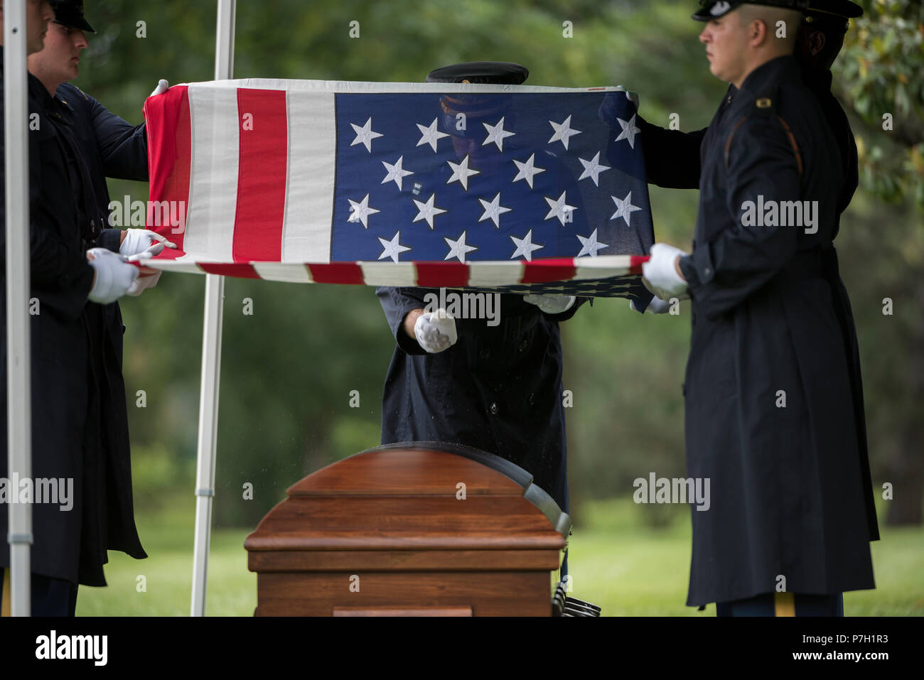 U.S. Army Chaplain (Capt.) Matthew Whitehead sprinkles holy water on a ...