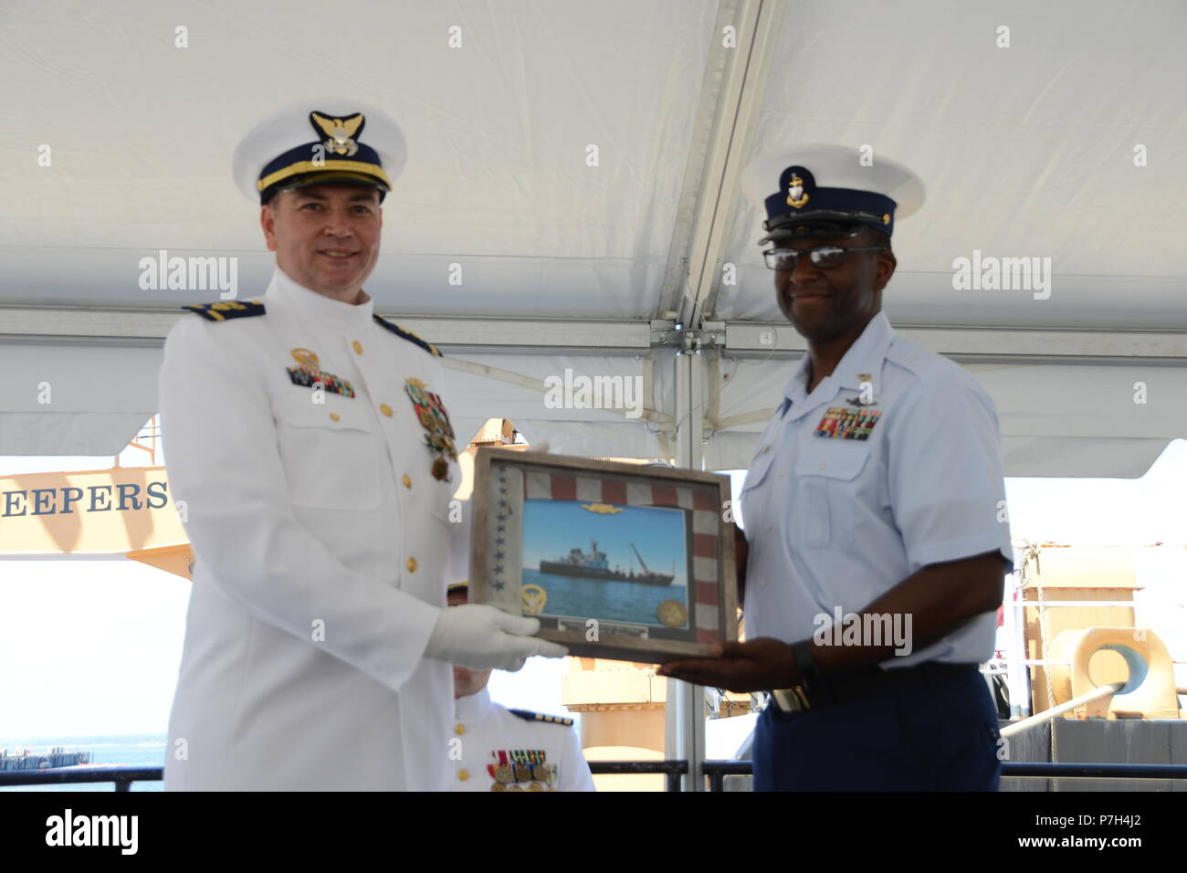 The crew of the Coast Guard Cutter Ida Lewis presented Chief Warrant ...