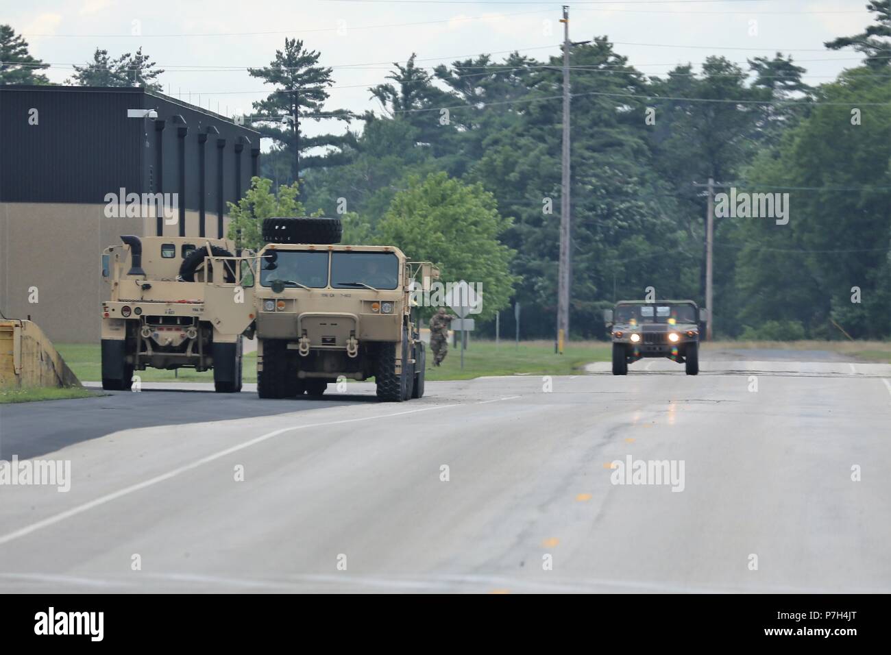 Soldiers operate vehicles on the cantonment area during the 86th ...