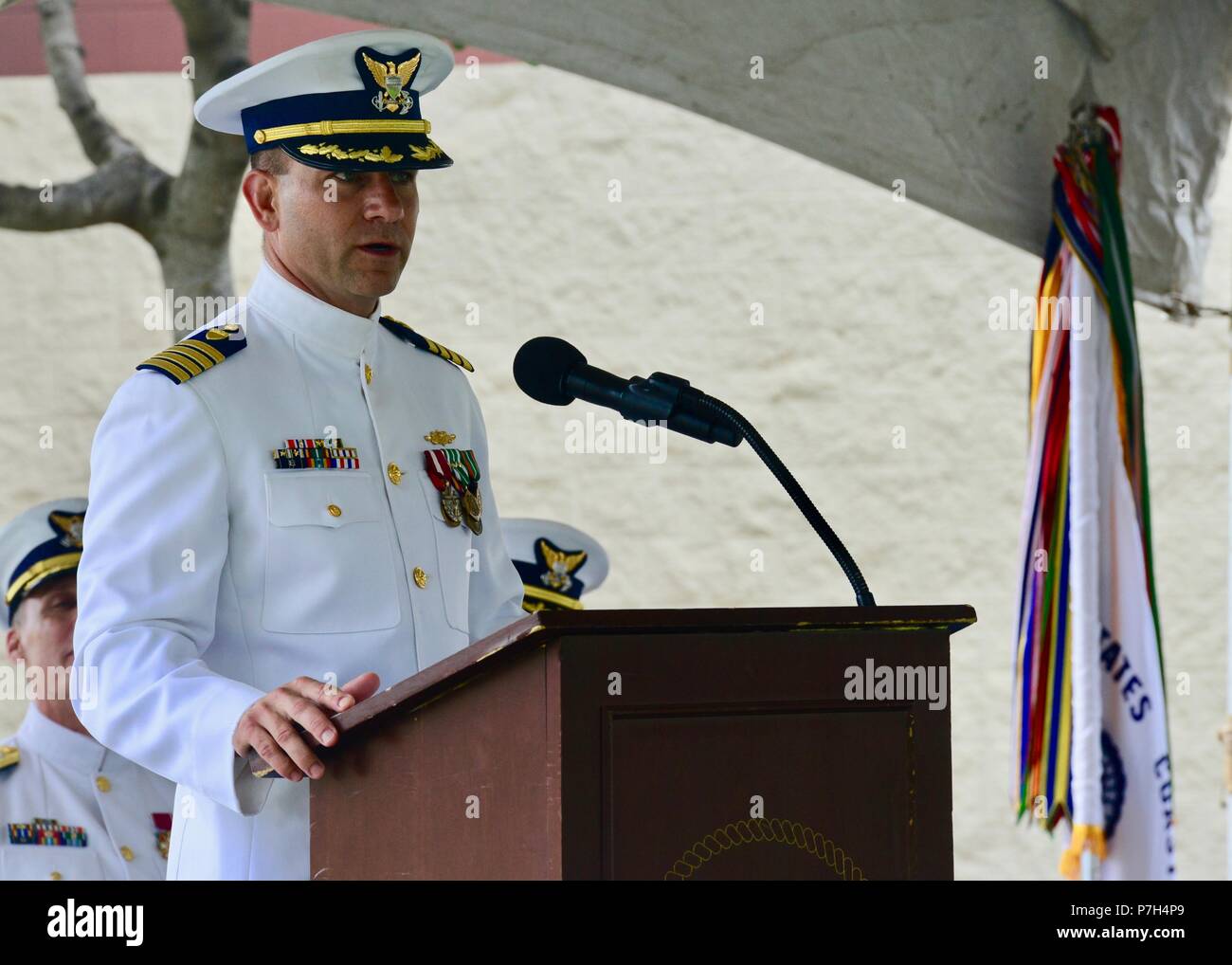 Capt. Travis Rasmussen gives remarks at a change of command ceremony ...