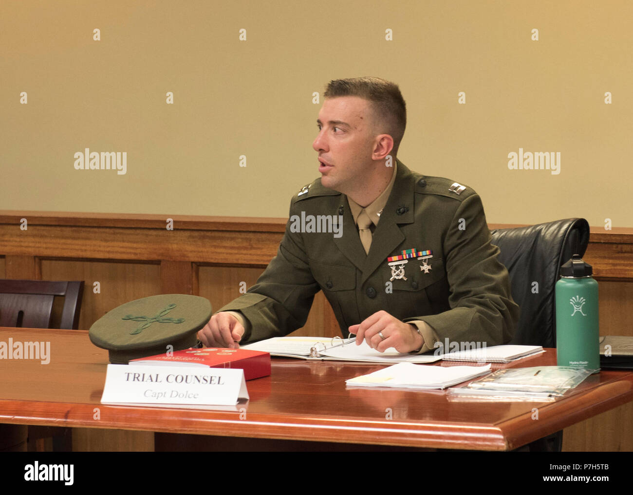 Capt. Eric Dolce, U.S. Marine Corps staff judge advocate, prepares for ...