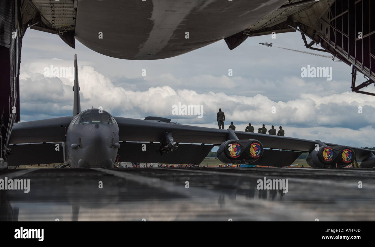 Through the back of a C-5 Galaxy, aircrew assigned to the 5th Bomb ...