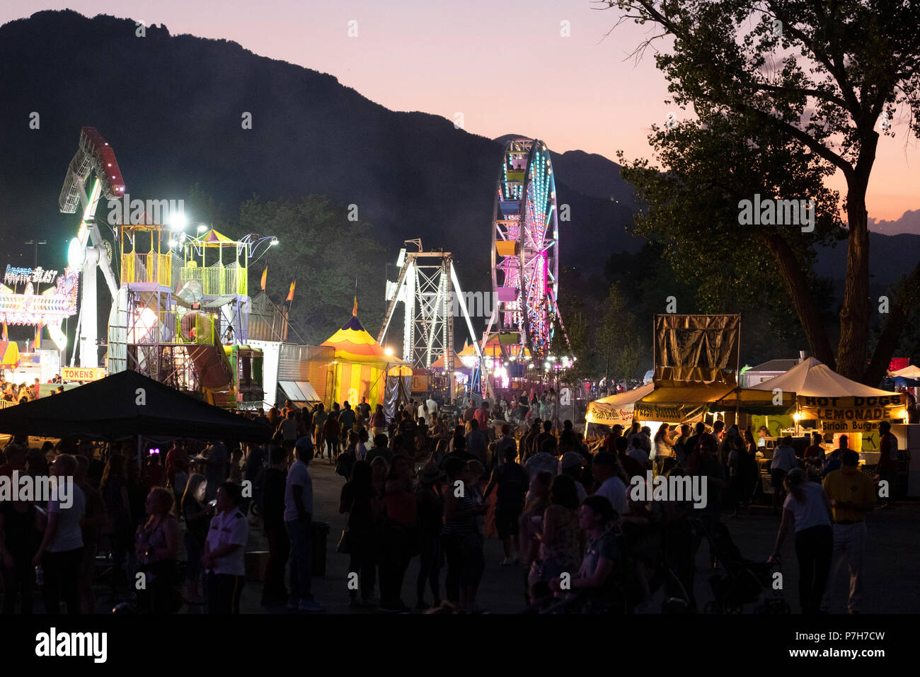Soldiers, family members and local citizens enjoy rides, games and ...
