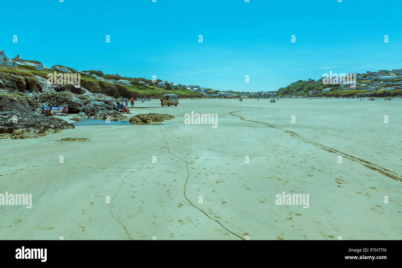 A beach scene at Polzeath in North Cornwall, United Kingdom Stock Photo ...
