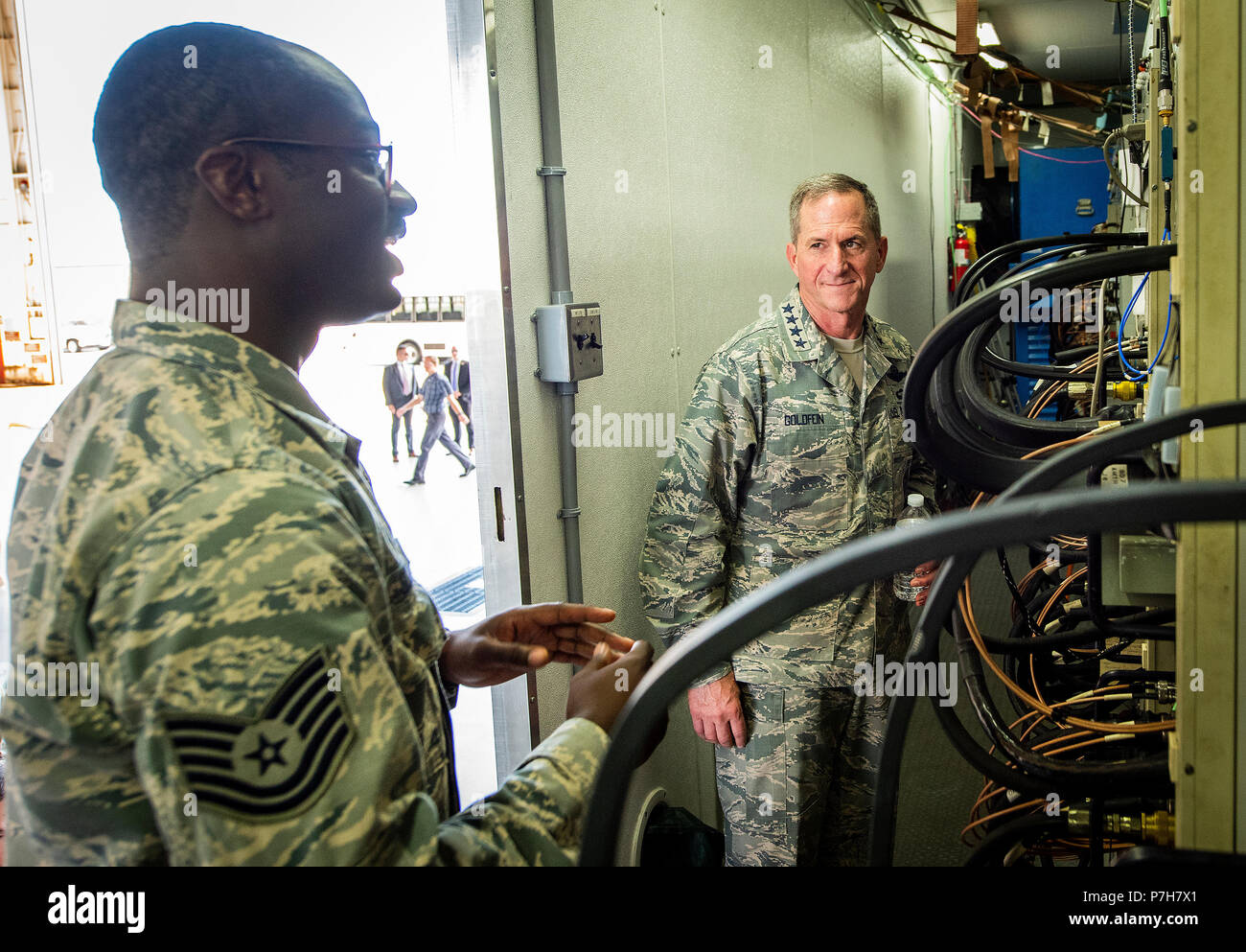 Tech. Sgt. Darien Scott, 16th Electronic Warfare Squadron, talks to Air Force Chief of Staff Gen ...