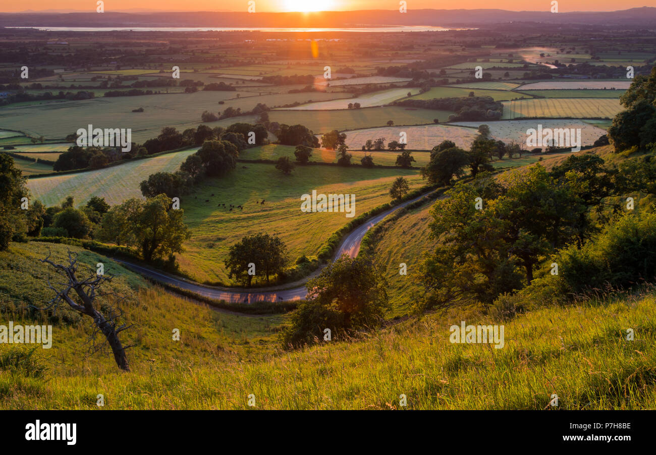 Sunset view from Coaley Peak, near Stroud looking across the Severn ...