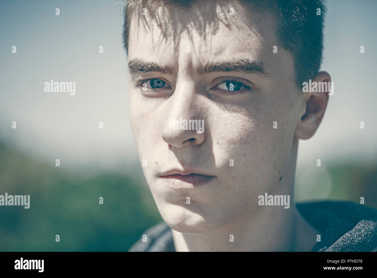 portrait of a serious young man Stock Photo - Alamy