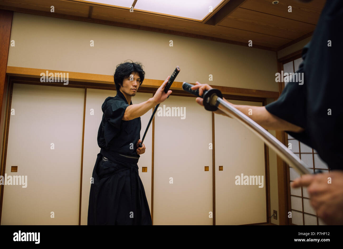Samurai training in a traditional dojo hi-res stock photography and ...