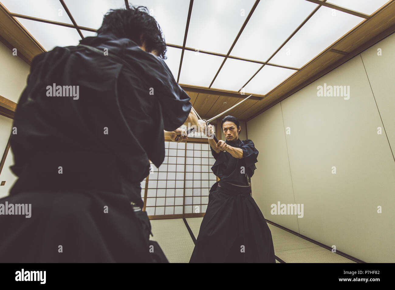Samurai training in a traditional dojo hi-res stock photography and ...