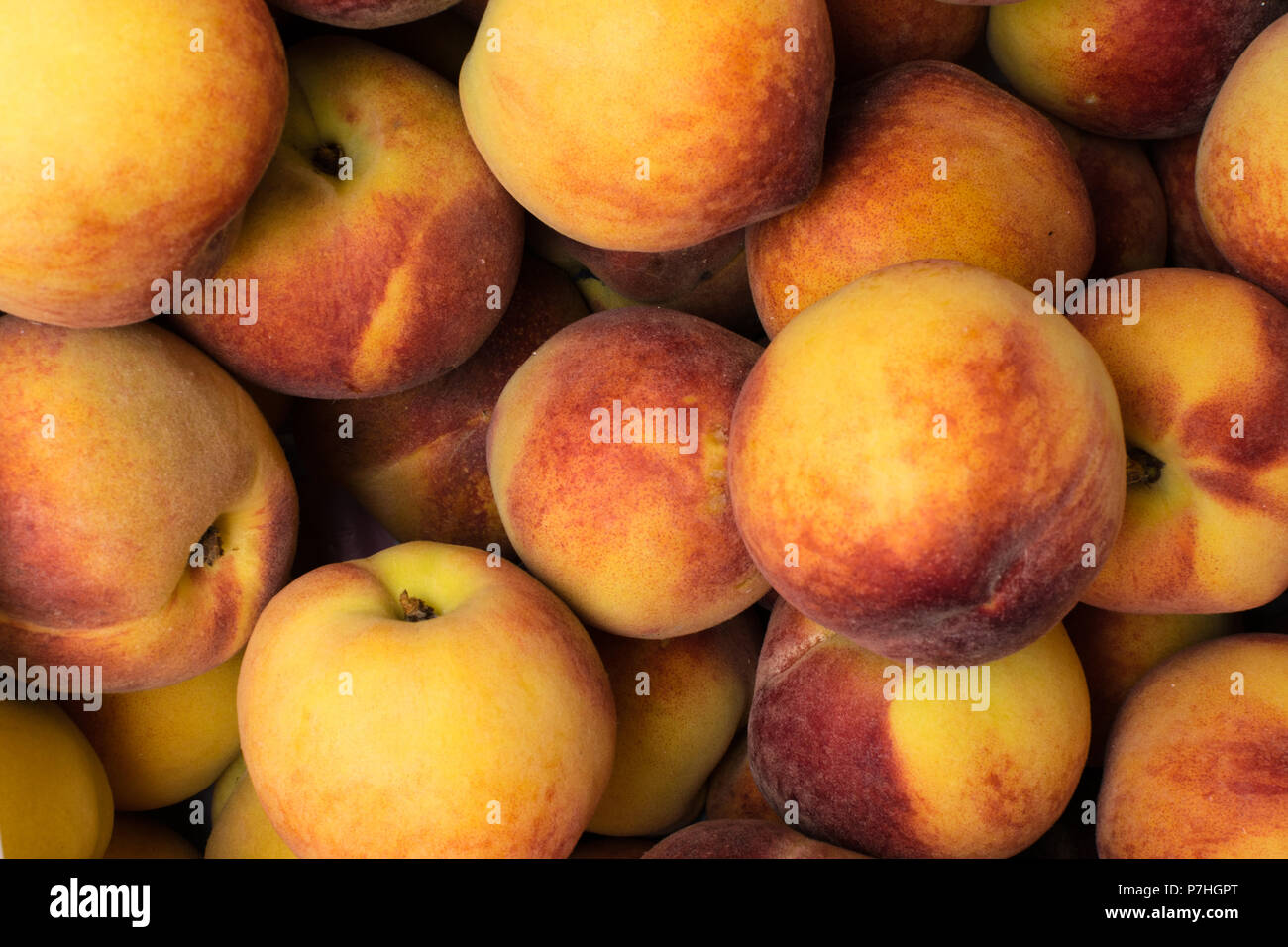 Fresh natural apricot background in market Stock Photo - Alamy