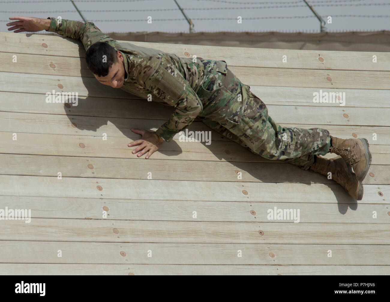 U.S. Army Spc. Alexander Dillon, a military policeman assigned to the ...