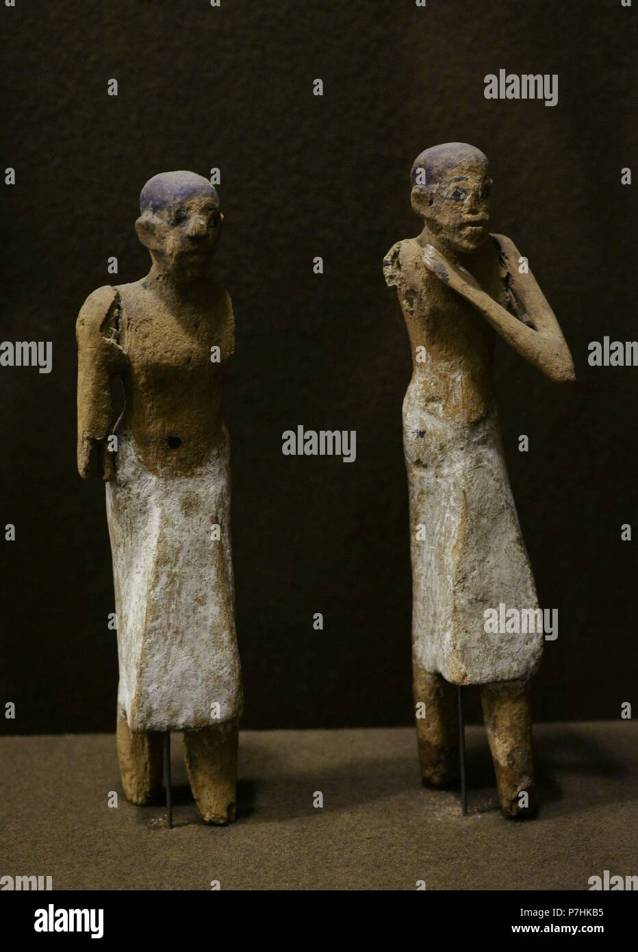 Male figurines of wood with traces of polychrome. Placed inside the ...