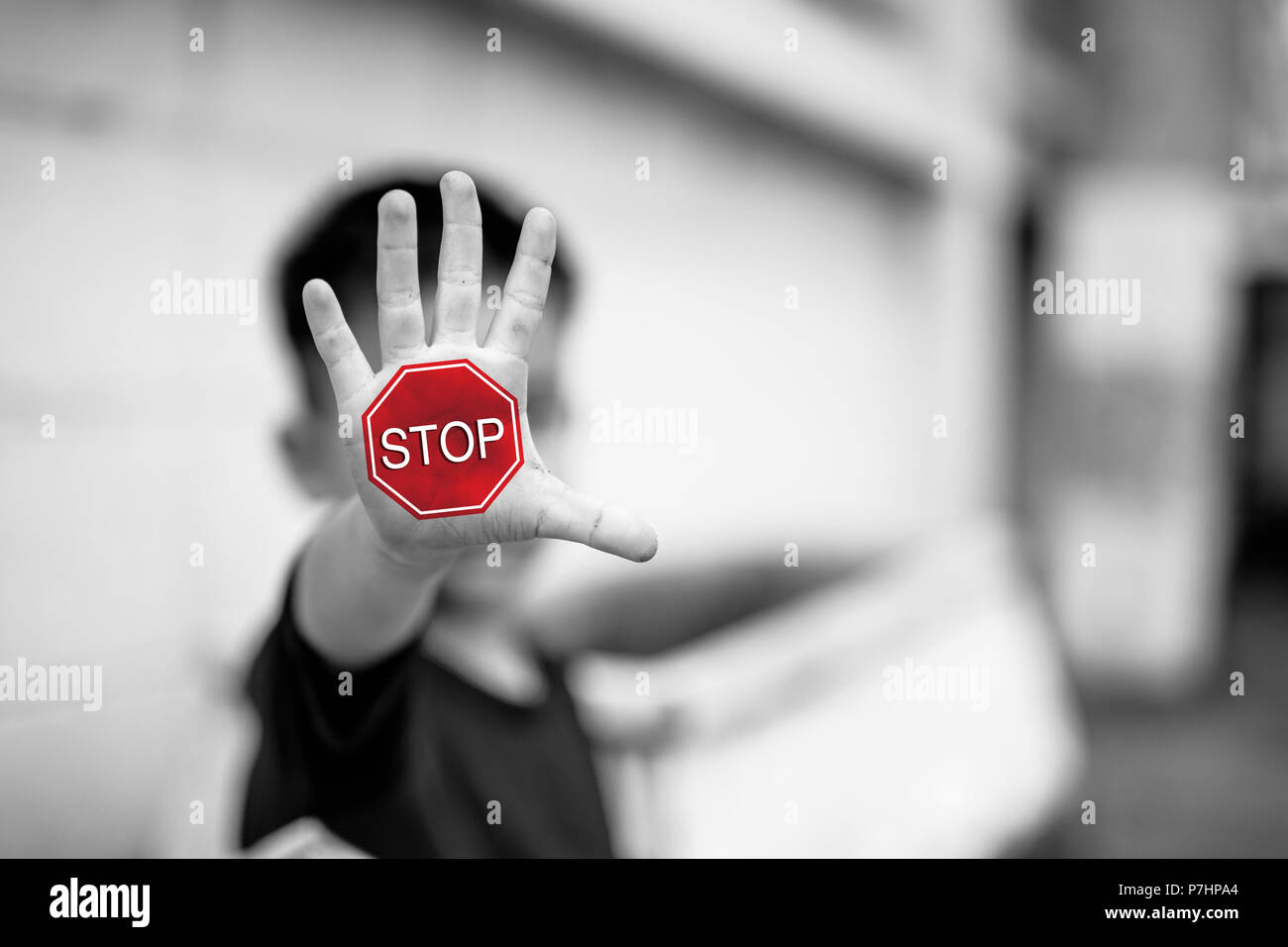 Stop, Child standing with outstretched hand showing stop, Violence ...