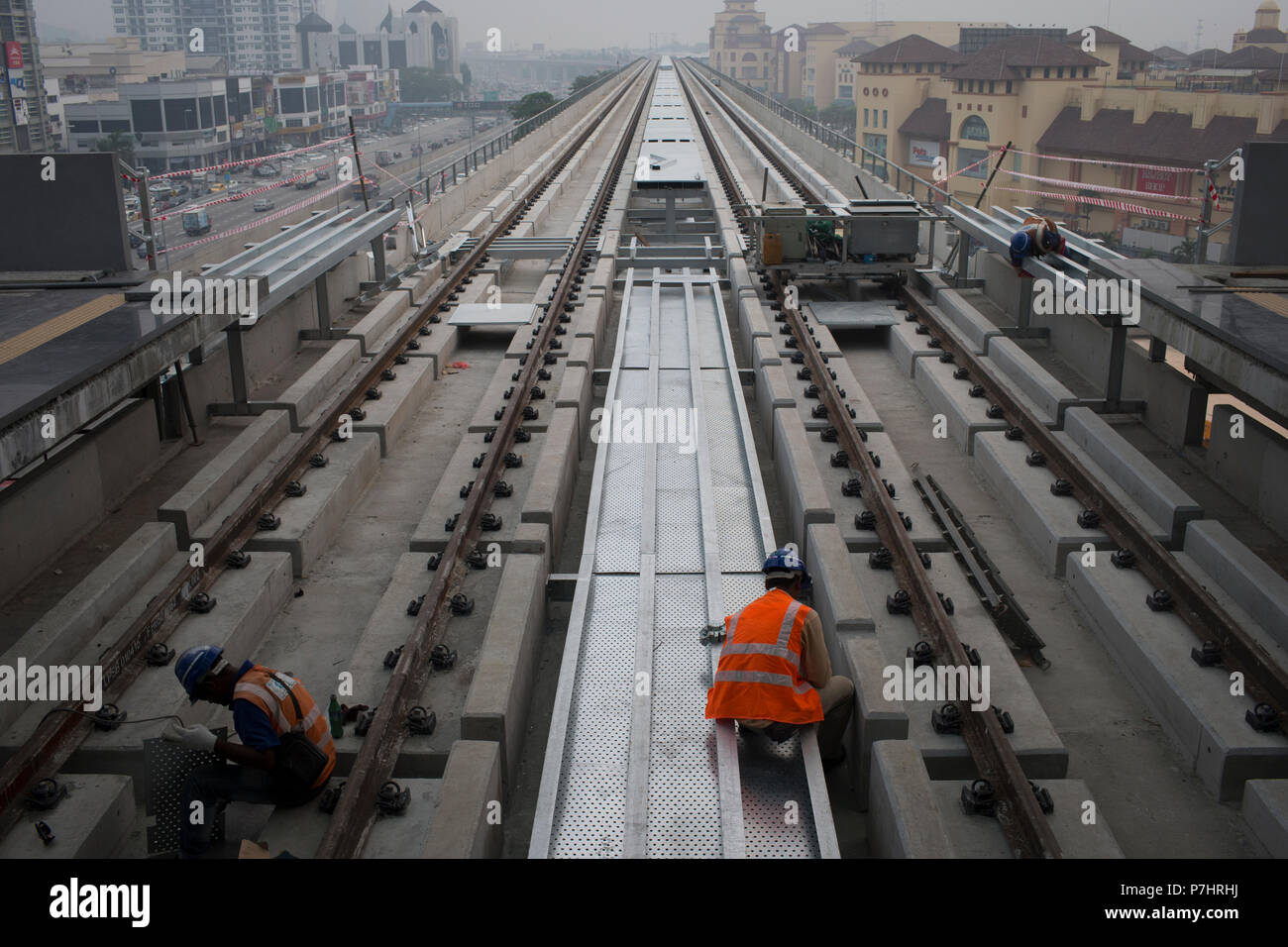 Construction work on the new elevated train system around Malaysia's ...