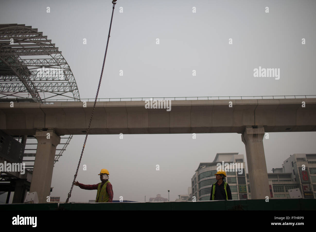 Construction work on the new elevated train system around Malaysia's ...