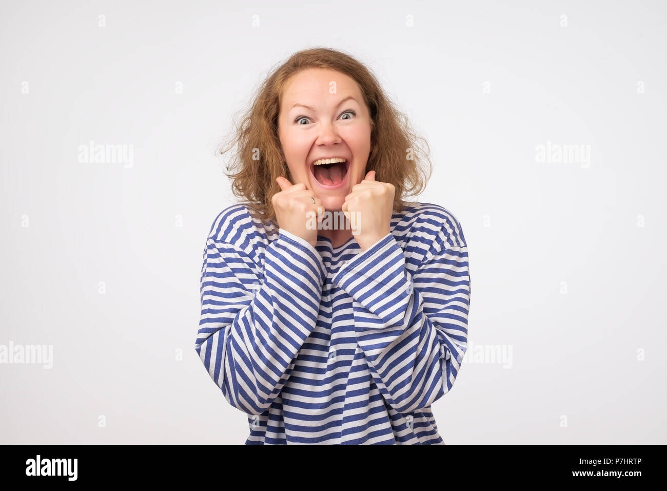 Shocked smiling hi-res stock photography and images - Alamy