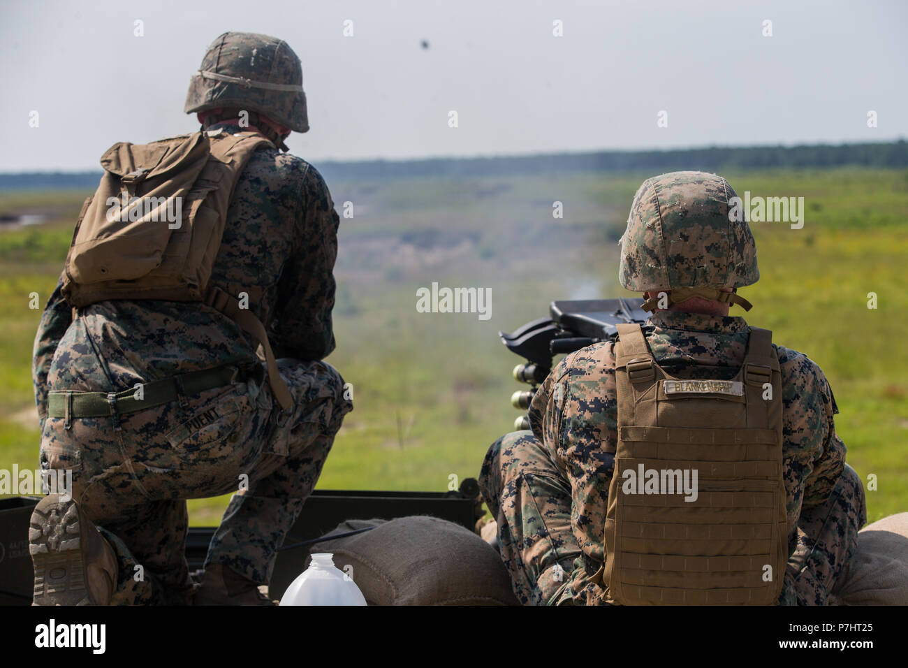 U.S. Marine Corps Cpl. Benjamin S. Puent and Cpl. Kevin P. Blankenship ...