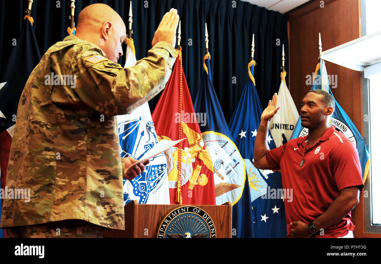 Maj. Gen. Michael Thompson, adjutant general for Oklahoma, administers ...