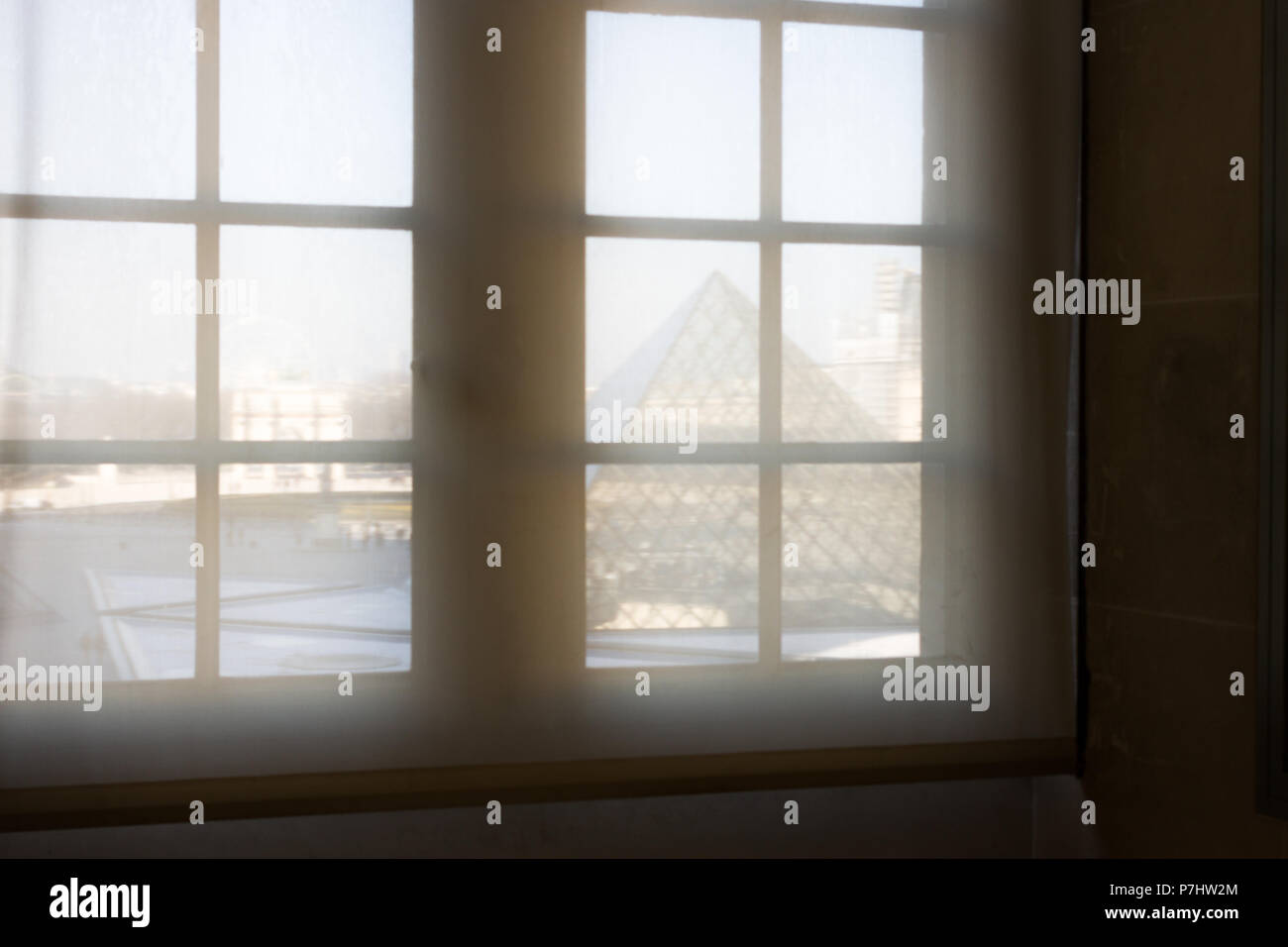 Paris, France - January 19, 2017: Looking through window from Louvre ...