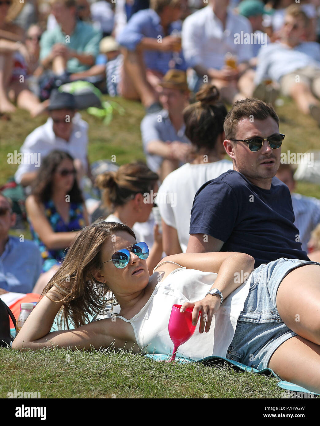 Spectators watch the big screen on Murray Mound on day five of the ...