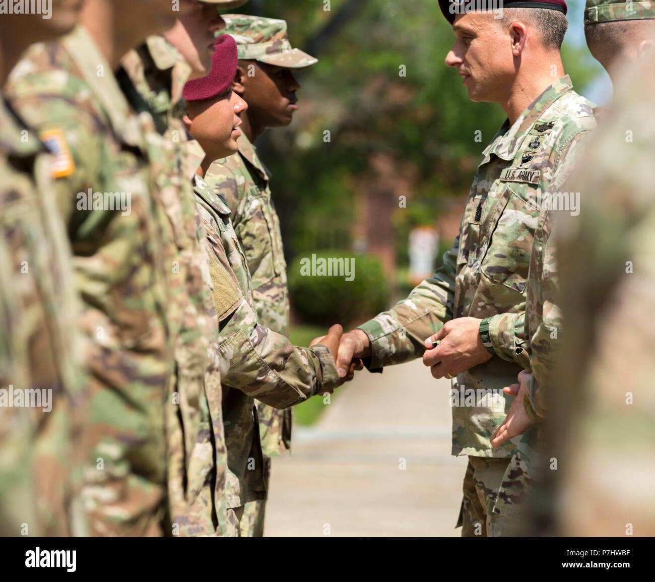 U. S. Army Command Sgt. Maj. Charles W. Albertson shakes hand to the ...