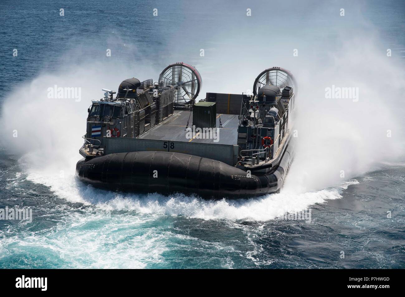 180703-N-XK809-121 PACIFIC OCEAN, (July 3, 2018) Landing craft air cushion (LCAC) 58, assigned ...