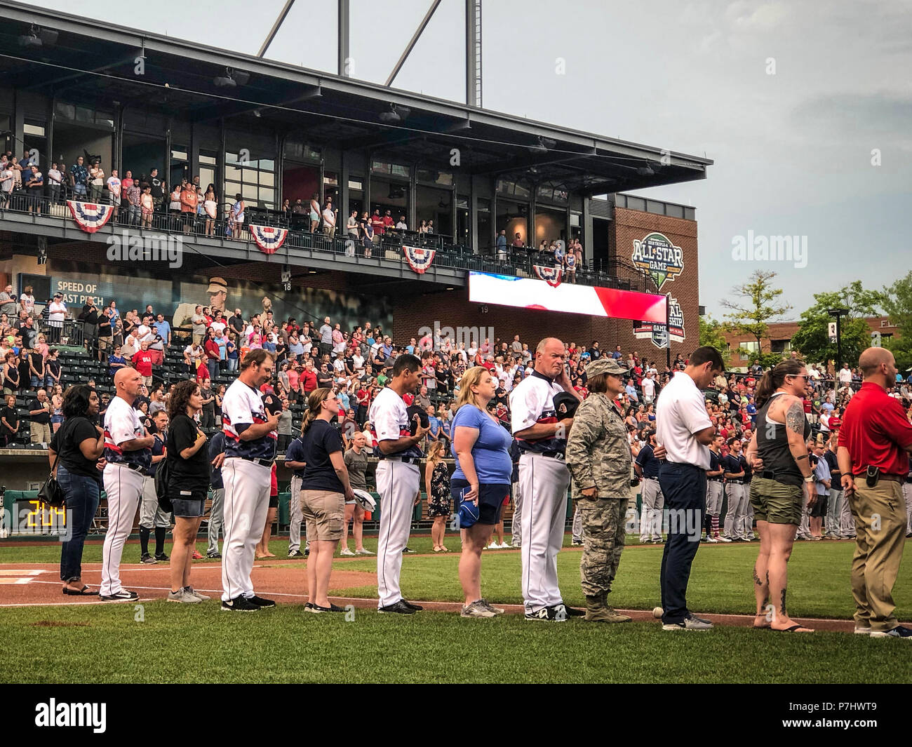 Col. Allison Miller throws the cermonial first pitch during a Columbus ...