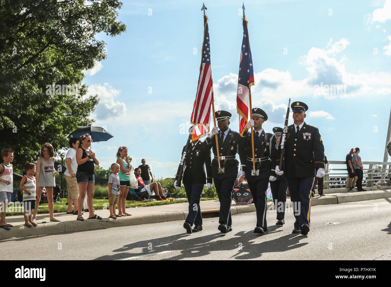 An Ohio National Guard joint color guard marches in the Red, White ...