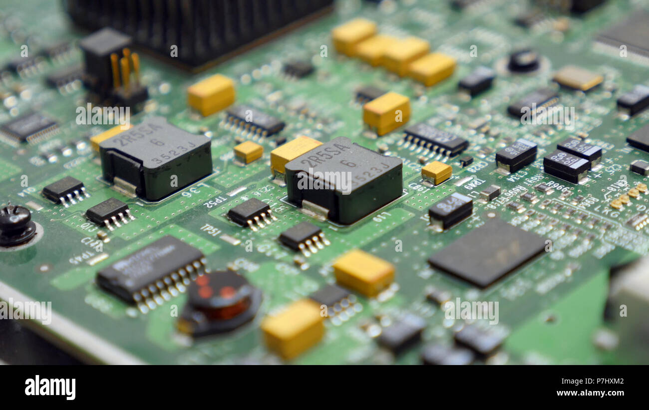 Electronic printed circuit board with many electrical components Stock ...