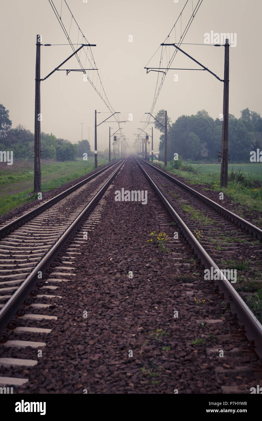 Empty railway tracks diminishing perspective Stock Photo - Alamy