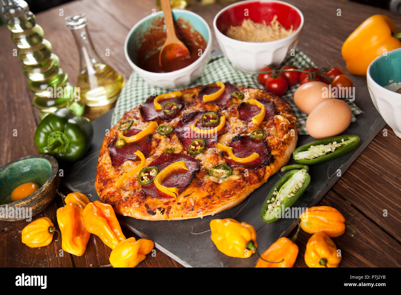 Fresh italian pizza on wood. Fast food Stock Photo - Alamy