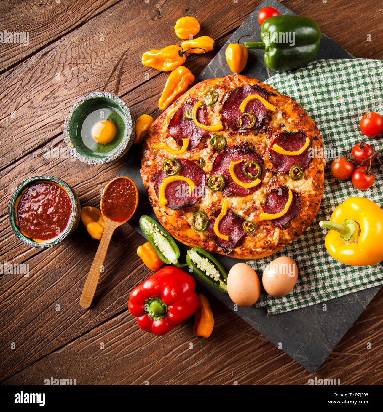 Fresh italian pizza on wood. Fast food Stock Photo - Alamy