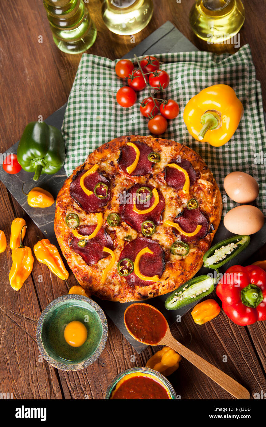 Fresh italian pizza on wood. Fast food Stock Photo - Alamy