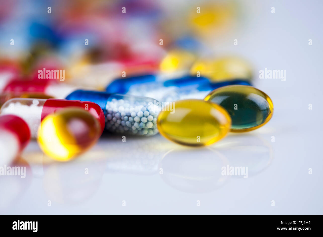 Closeup of medical capsule, healthy background Stock Photo - Alamy