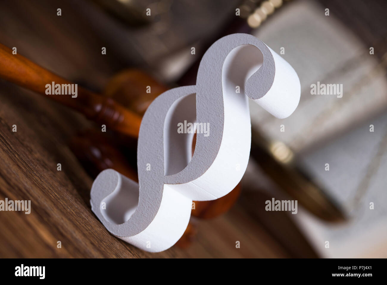 Wooden gavel barrister, justice concept, paragraph Stock Photo - Alamy