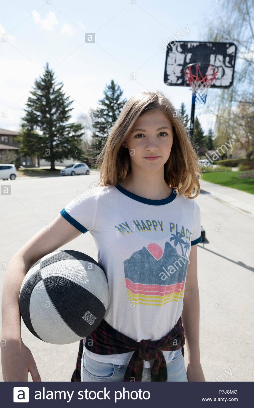 Girl with a basketball hi-res stock photography and images - Alamy
