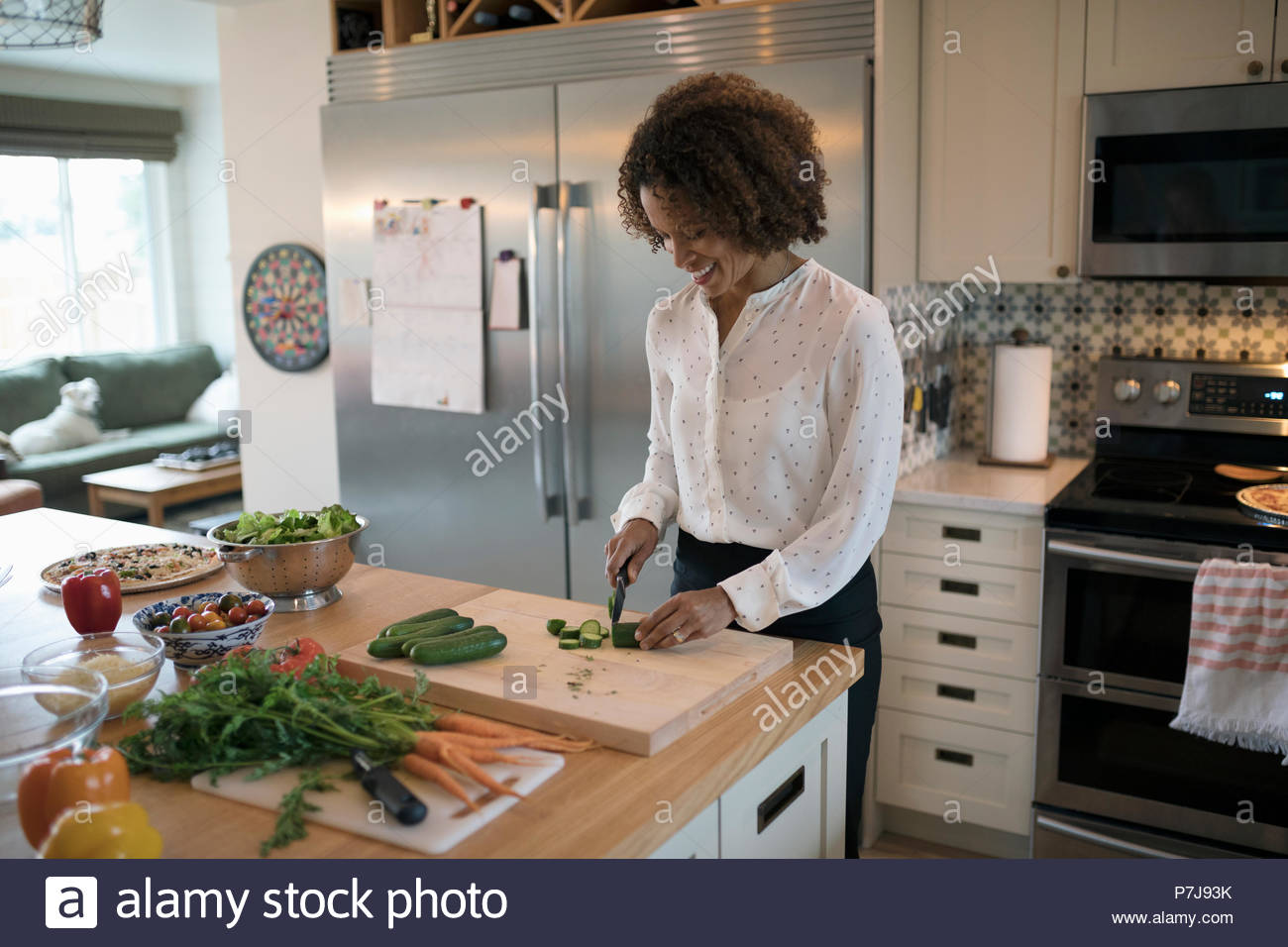 Kitchen woman cooking vegetable hi-res stock photography and images - Alamy
