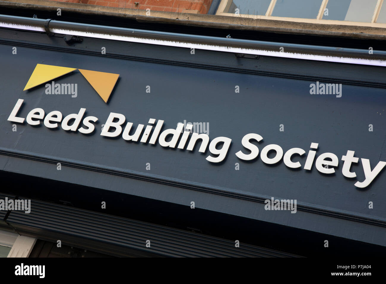 Sign for the brand and high street bank Leeds Building Society in ...