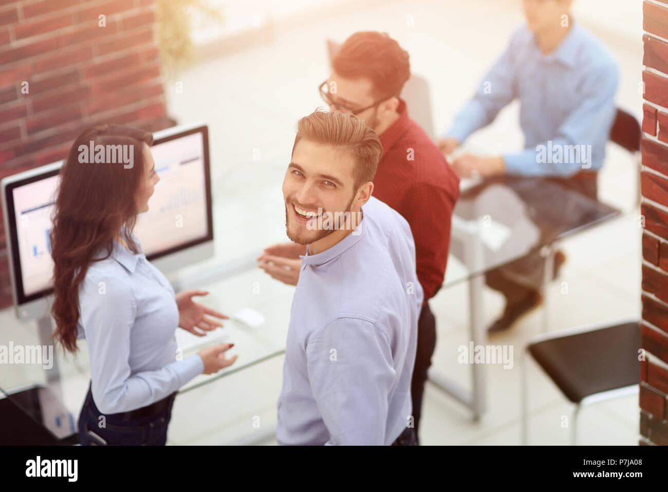 Business people discuss something at the meeting at the modern o Stock ...