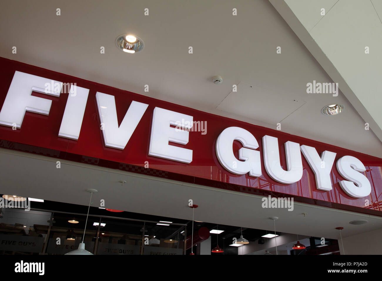Sign for the food and burger restaurant brand Five Guys in Birmingham ...
