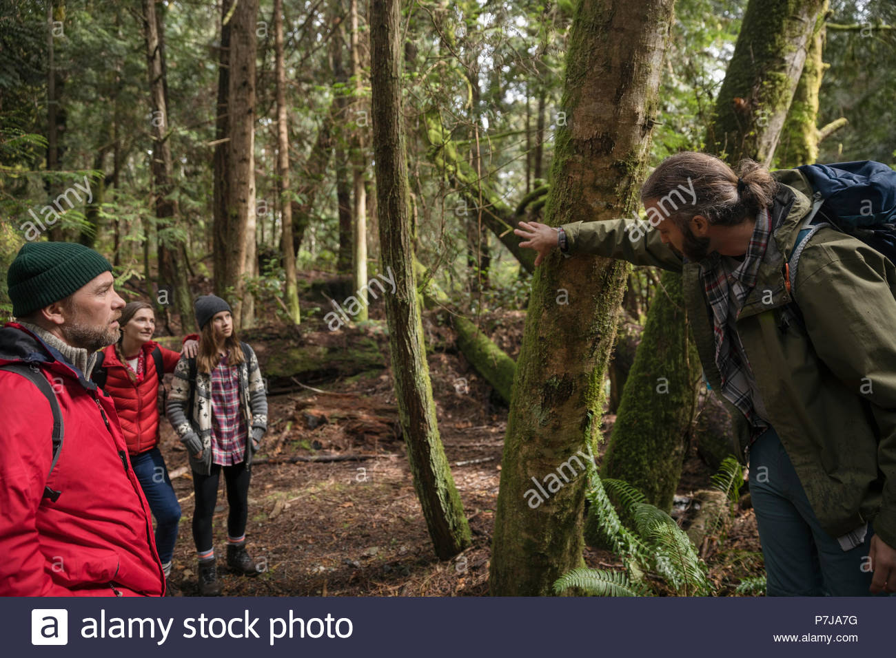 Guide leading people hi-res stock photography and images - Alamy