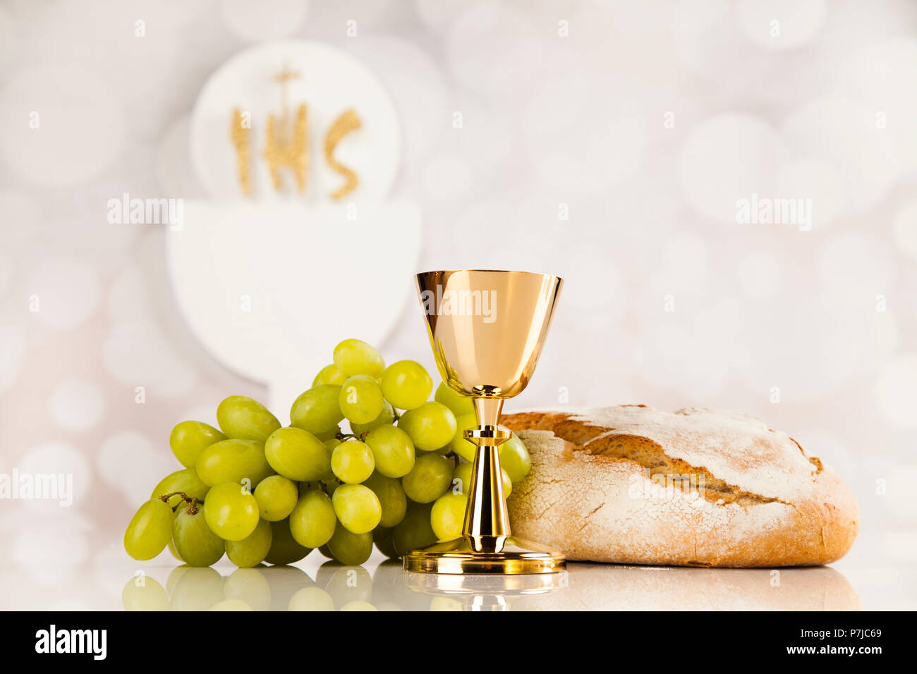 Holy communion a golden chalice, composition isolated on white Stock ...
