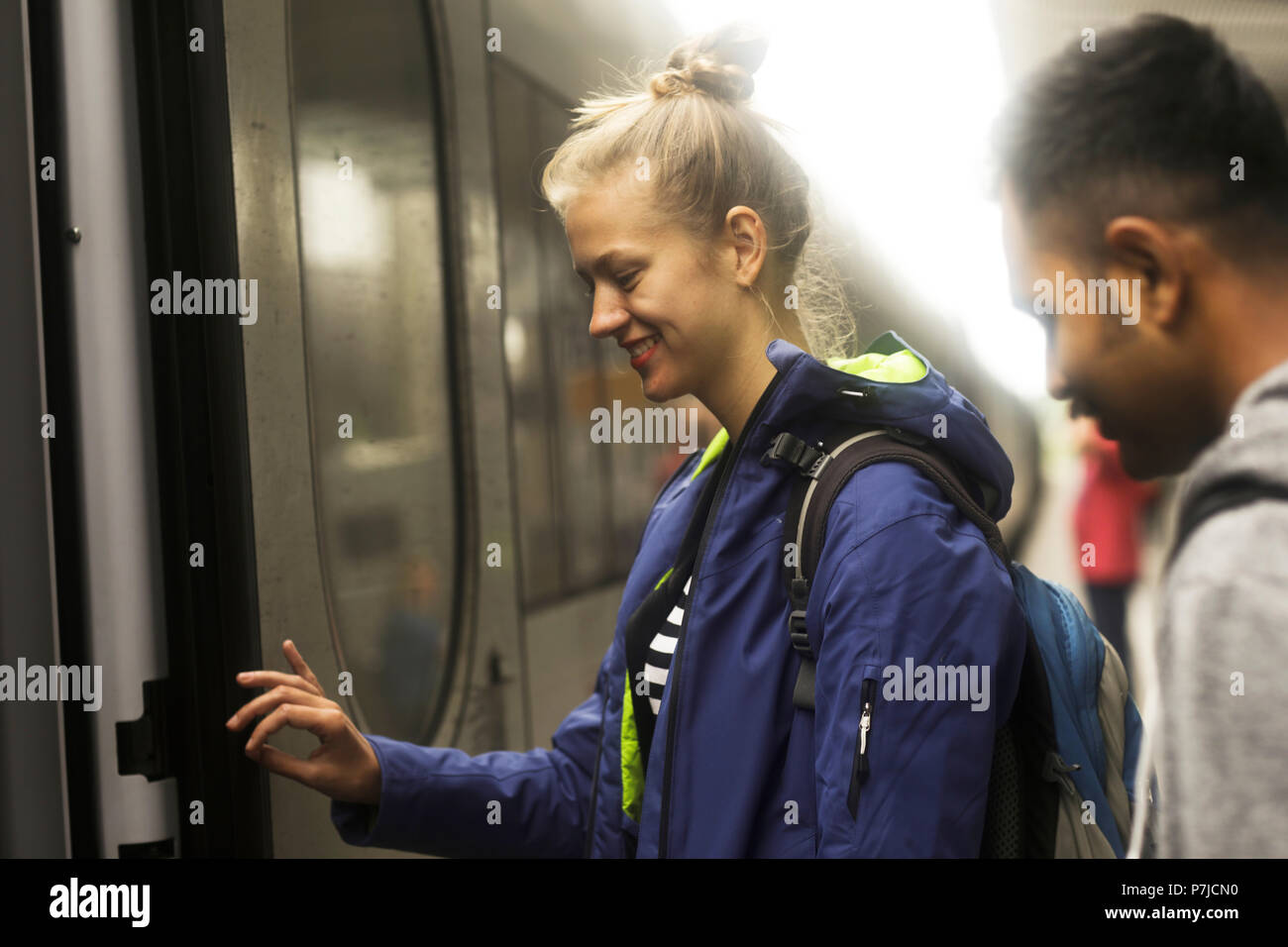 People standing at a train station hi-res stock photography and images ...