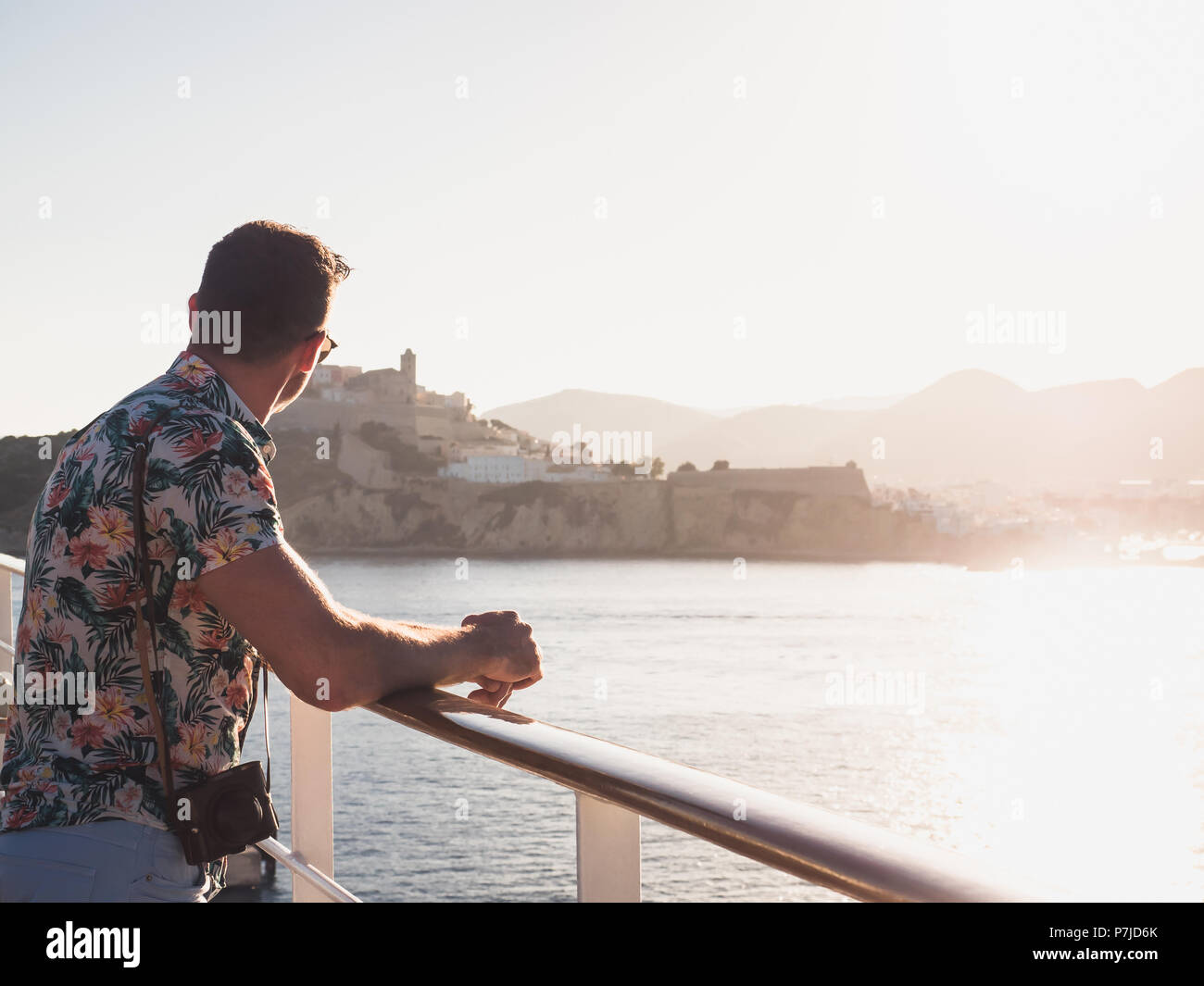 Attractive guy with a vintage camera Stock Photo - Alamy