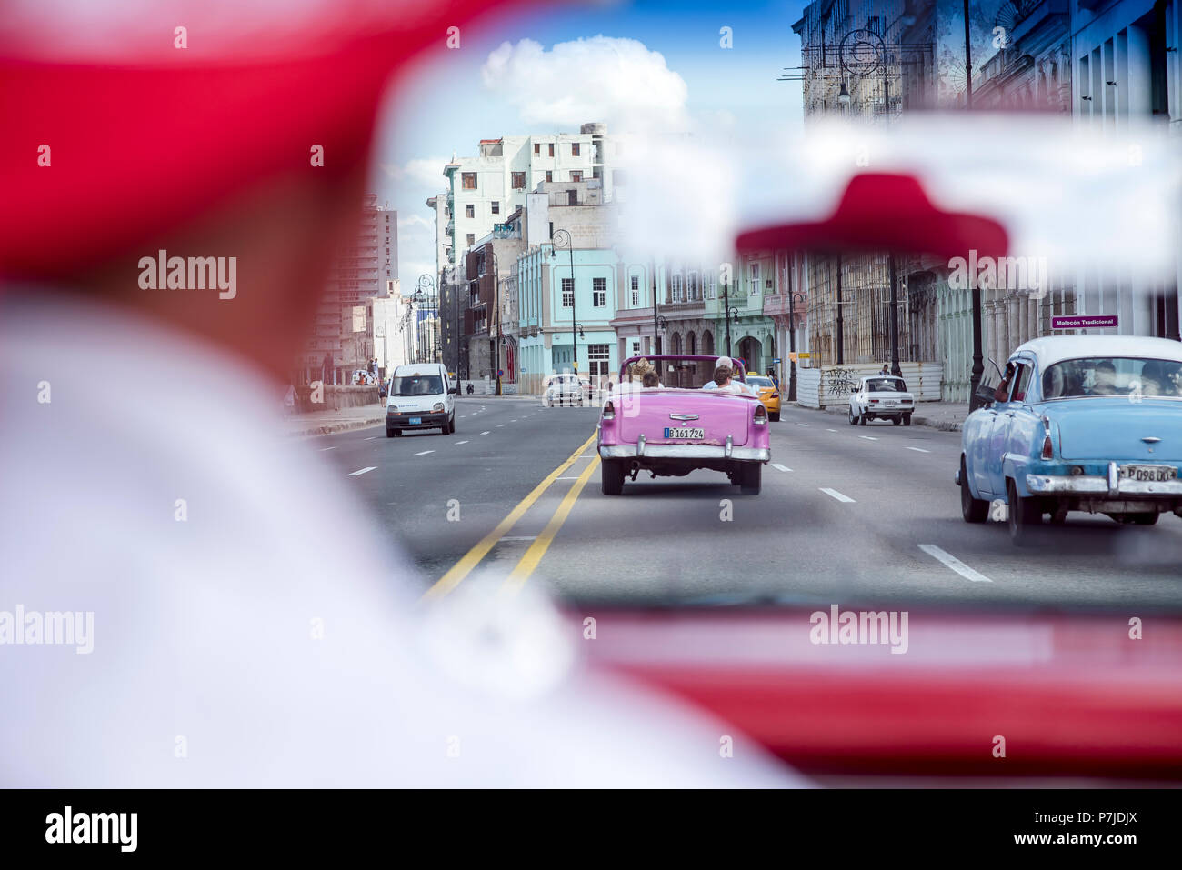 American tourists enjoy a driving tour of Havana by a Cuban-Armenian ...