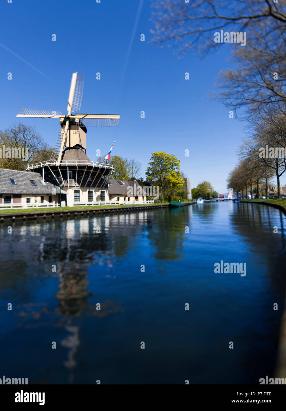Old windmill in holland Stock Photo - Alamy
