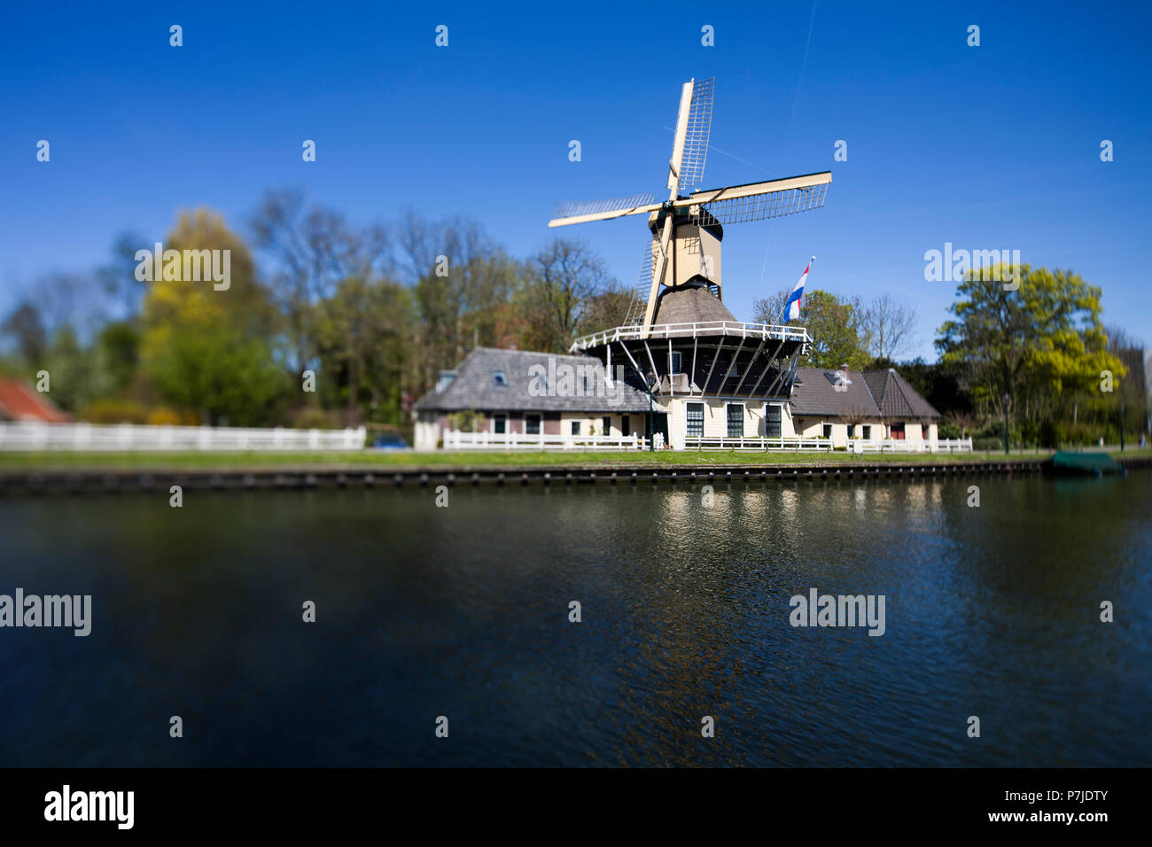 Old windmill in holland Stock Photo - Alamy