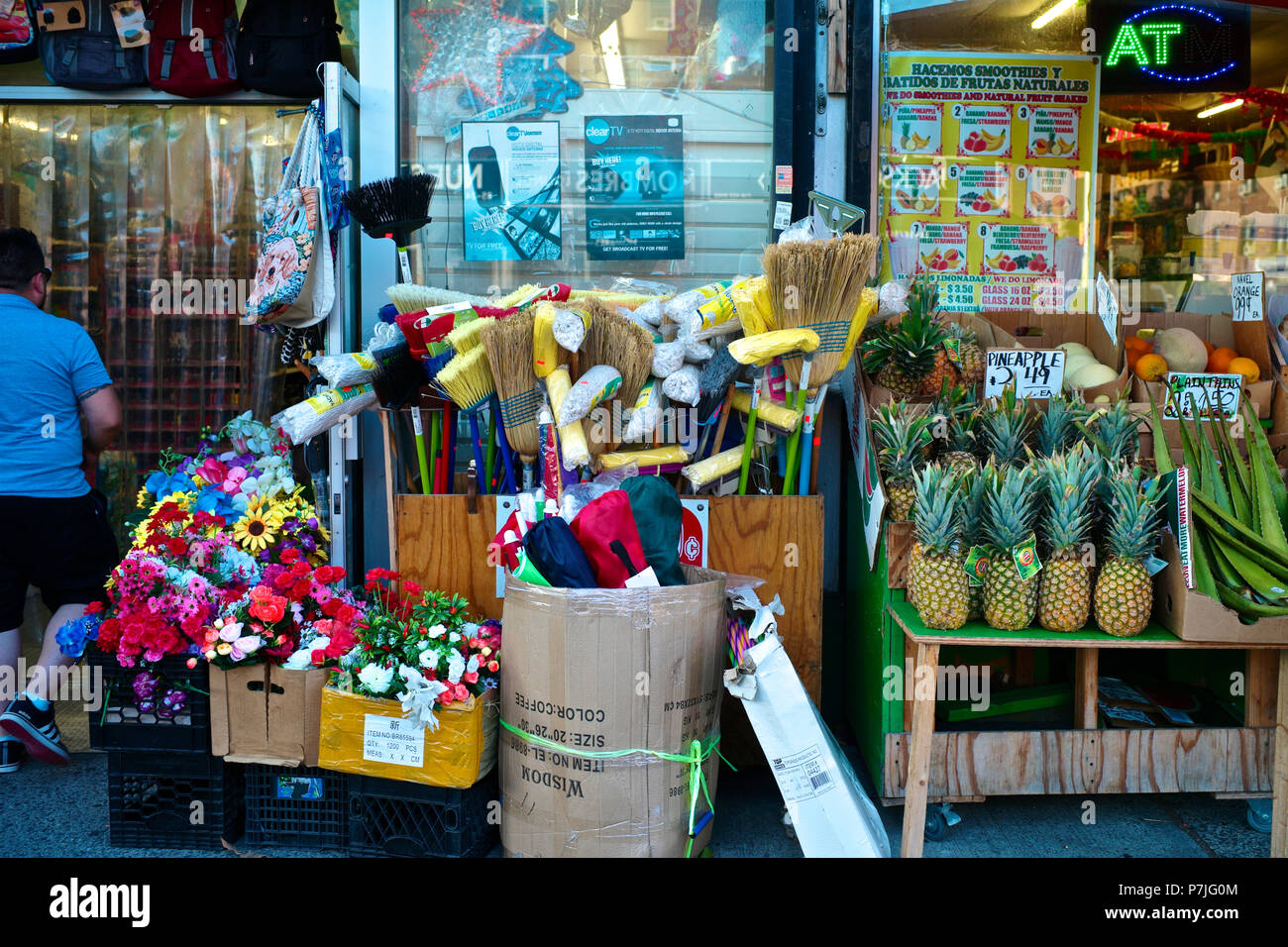 Outdoor display of items for sell at a store Stock Photo - Alamy