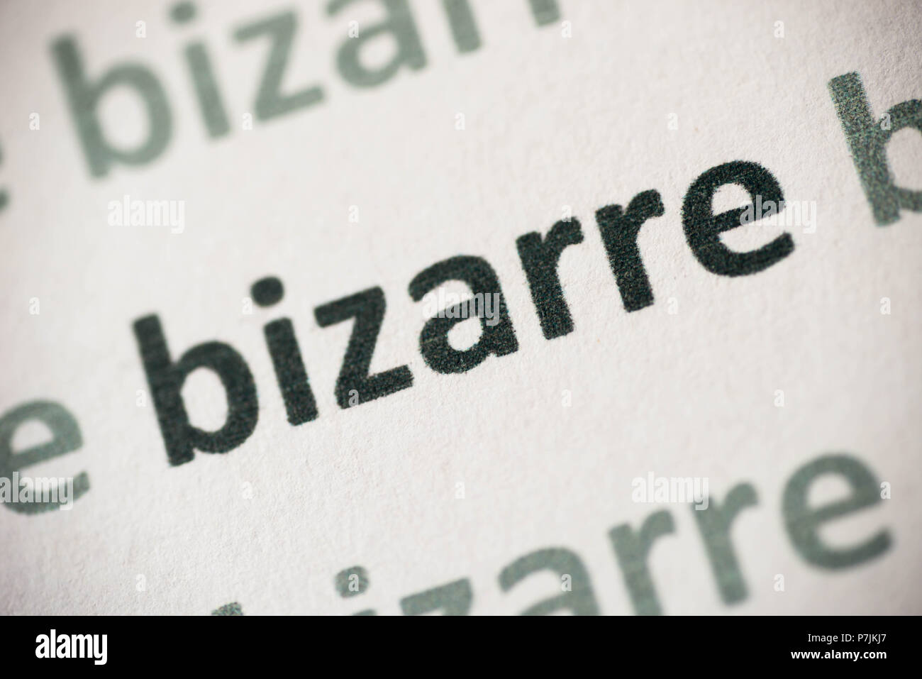 Word bizarre on dictionary hi-res stock photography and images - Alamy