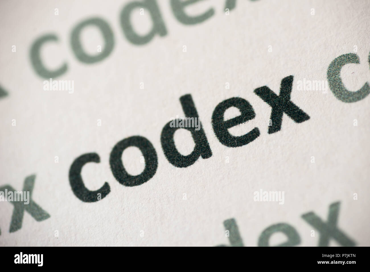 word codex printed on white paper macro Stock Photo - Alamy